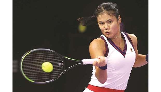Raducanu beats Bogdan to reach quarter-finals