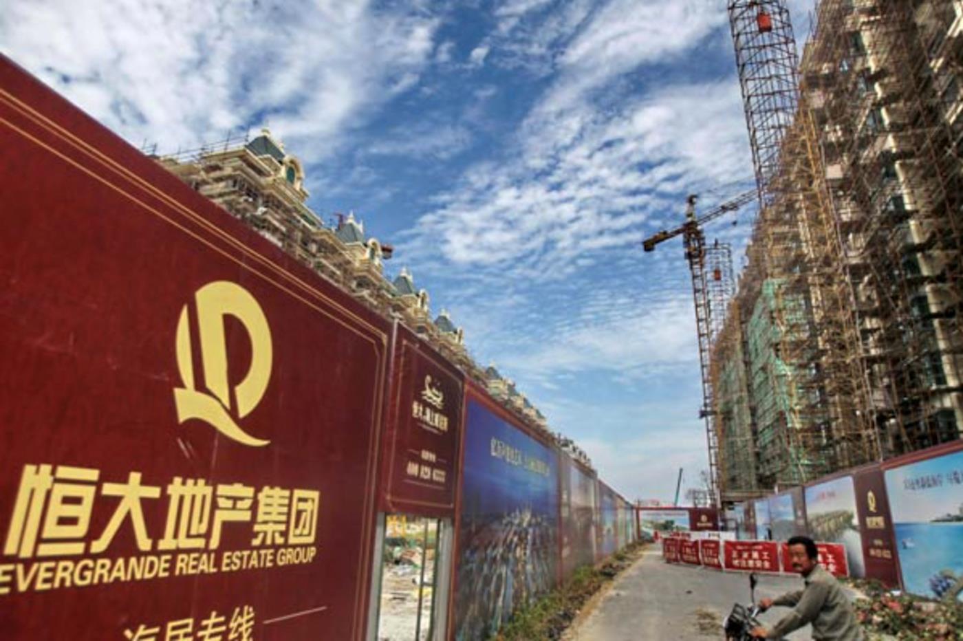 Evergrande ordered to start demolishing its properties