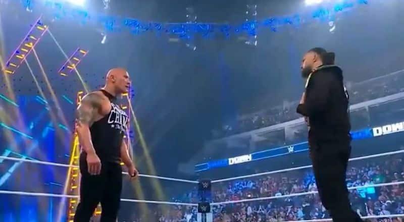 WWE: 'The Rock' Dwayne Johnson, Roman Reigns In A Dramatic Staredown On 'Smackdown' Ahead Of ...