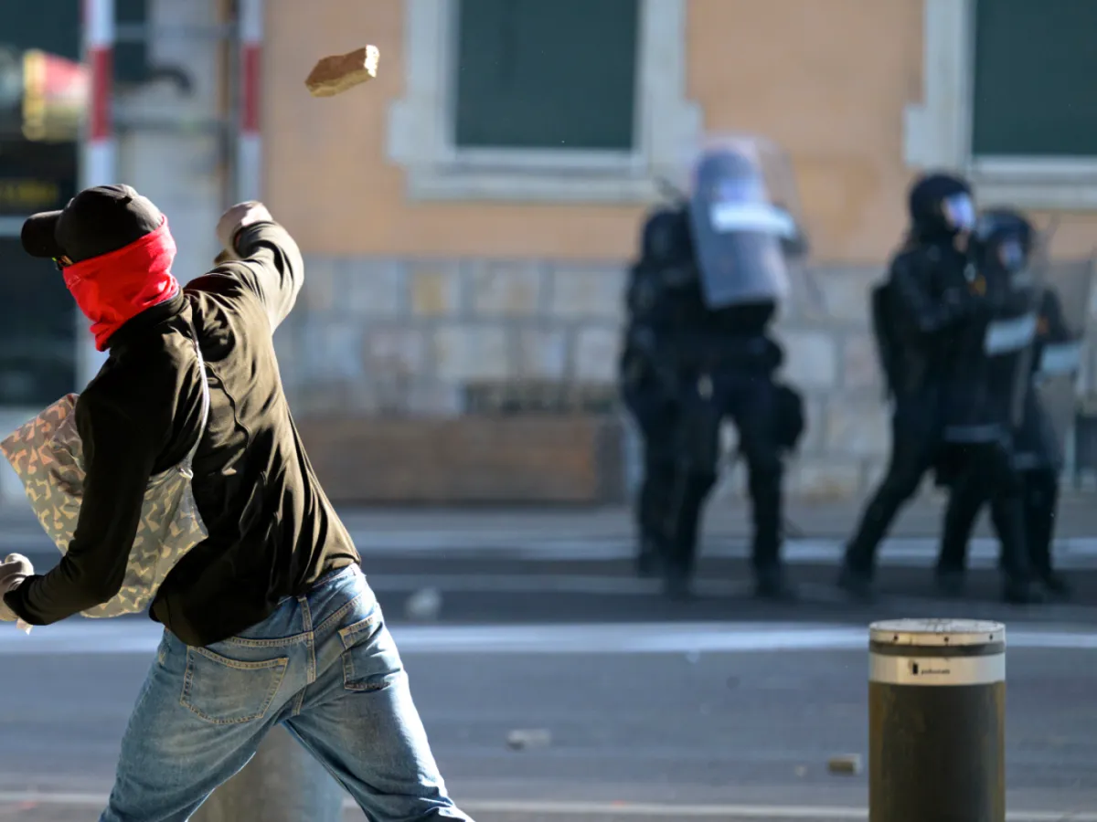 Protesters Smash Windows And Set Car Ablaze In Anti-G7 Protest In Geneva